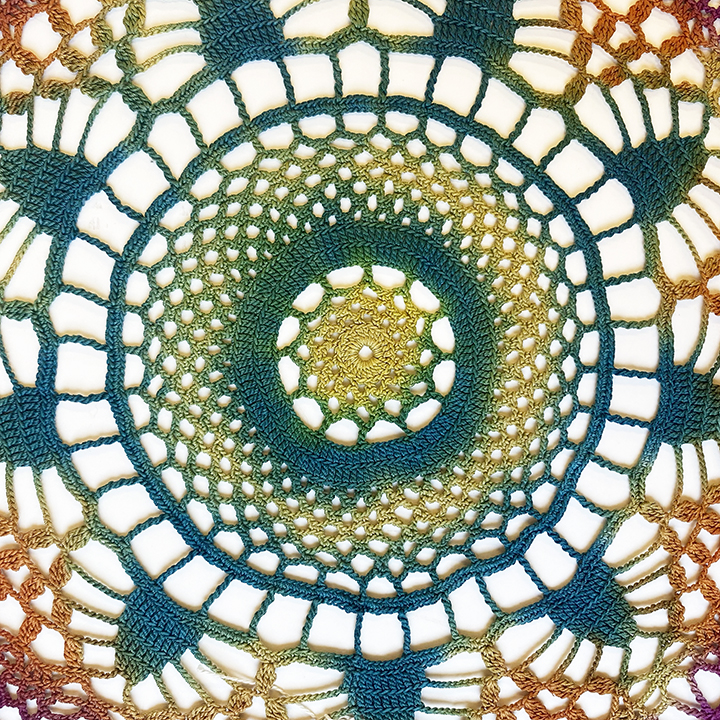 multi color doily closeup – Textile Center